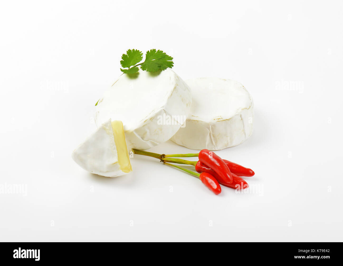 Wheels of soft white cheese Stock Photo - Alamy
