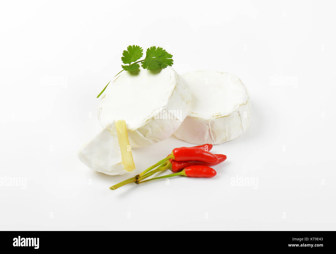 Wheels of soft white cheese Stock Photo - Alamy