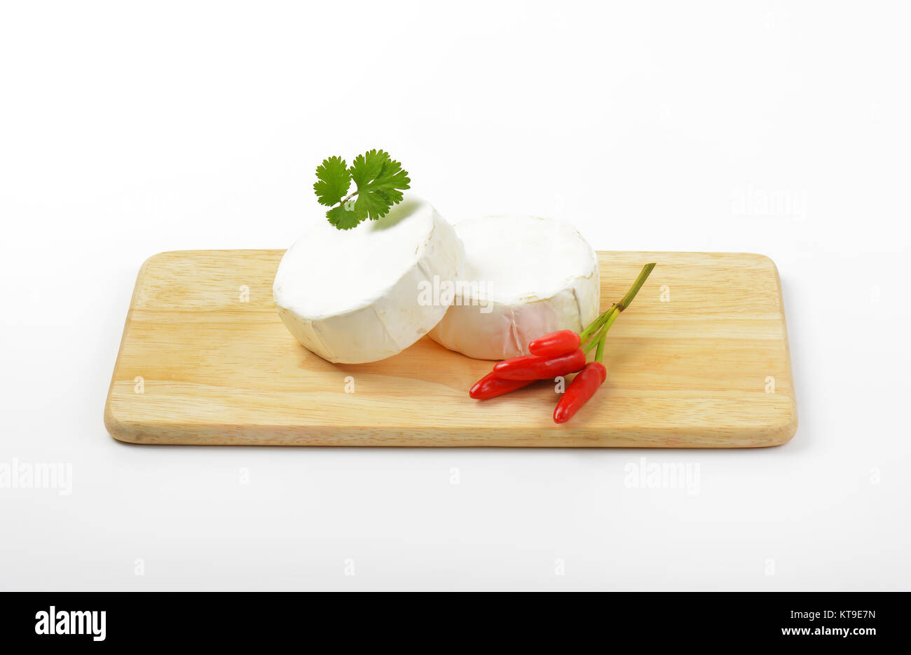 Wheels of soft white cheese Stock Photo - Alamy