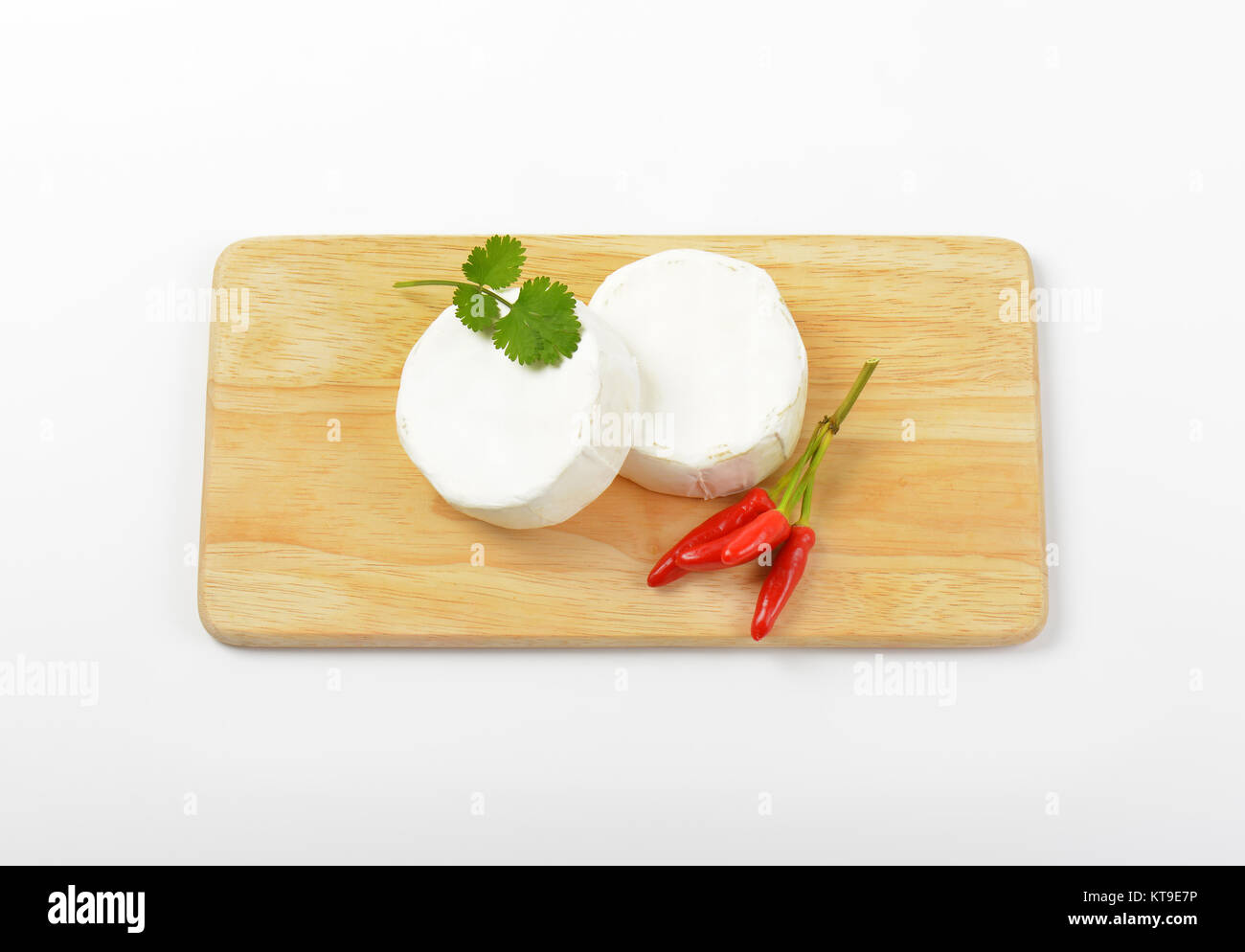Wheels of soft white cheese Stock Photo - Alamy