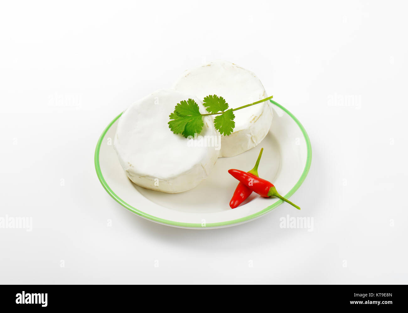 Wheels of soft white cheese Stock Photo - Alamy