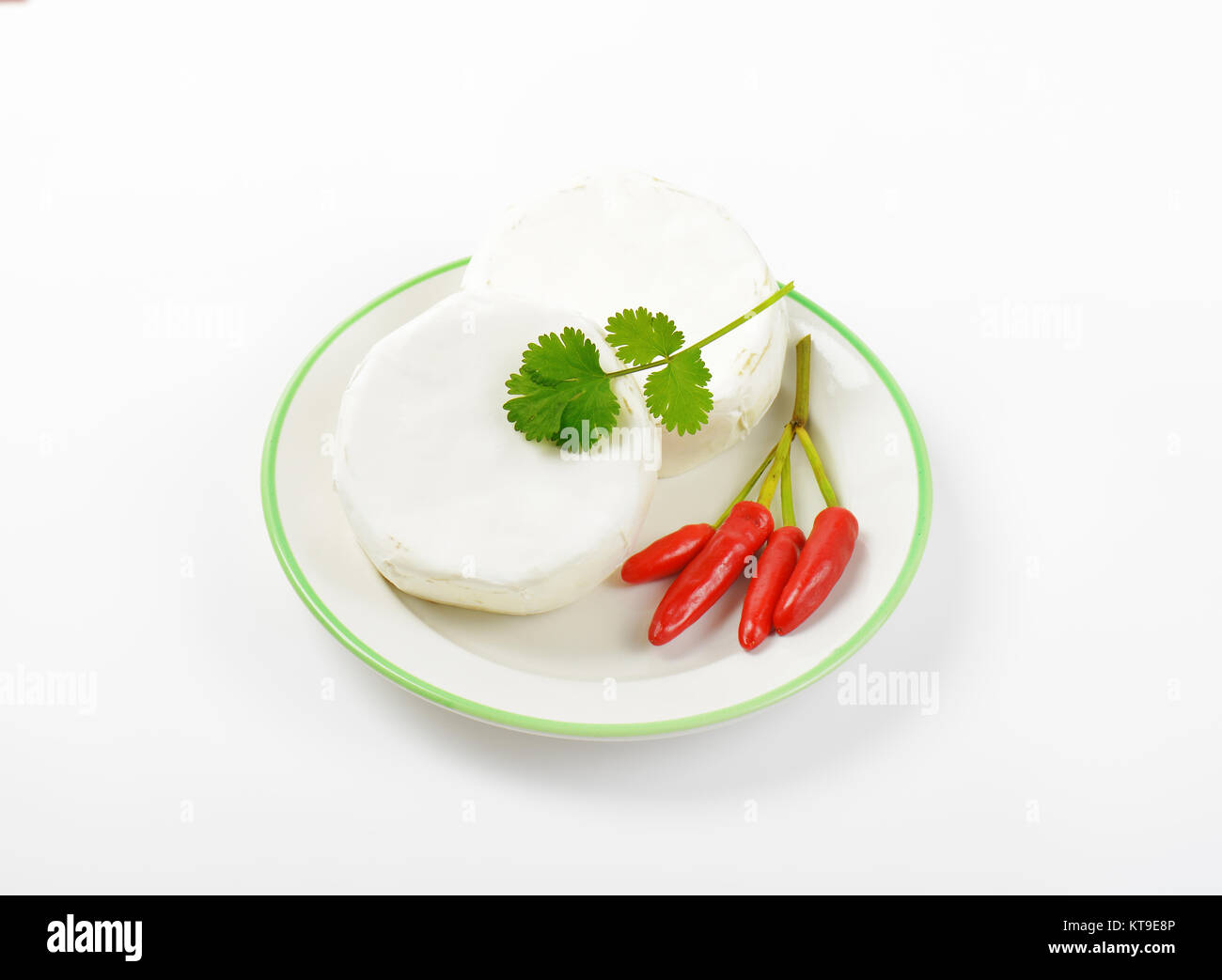 Wheels of soft white cheese Stock Photo - Alamy