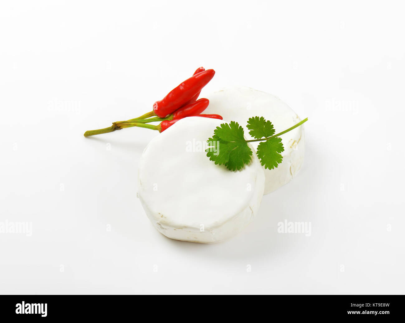 Wheels of soft white cheese Stock Photo - Alamy