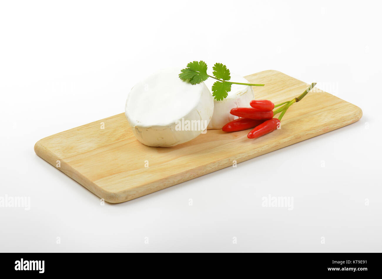 Wheels of soft white cheese Stock Photo - Alamy