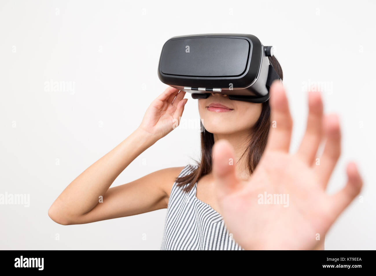 Young Woman Wearing Virtual Reality Headset Stock Photo - Alamy