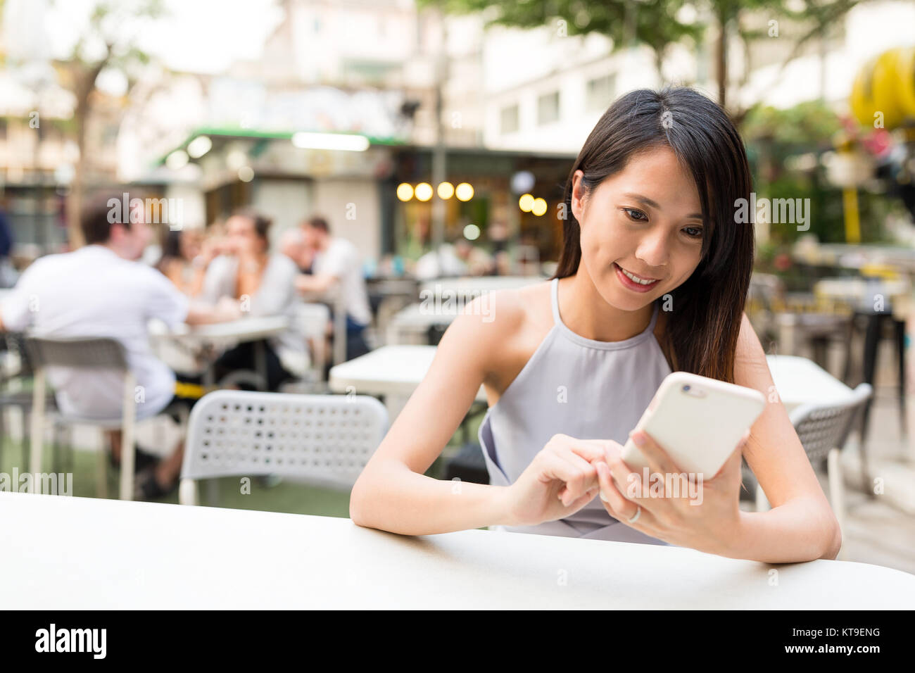 Woman wait for food in outdoor food market Stock Photo - Alamy