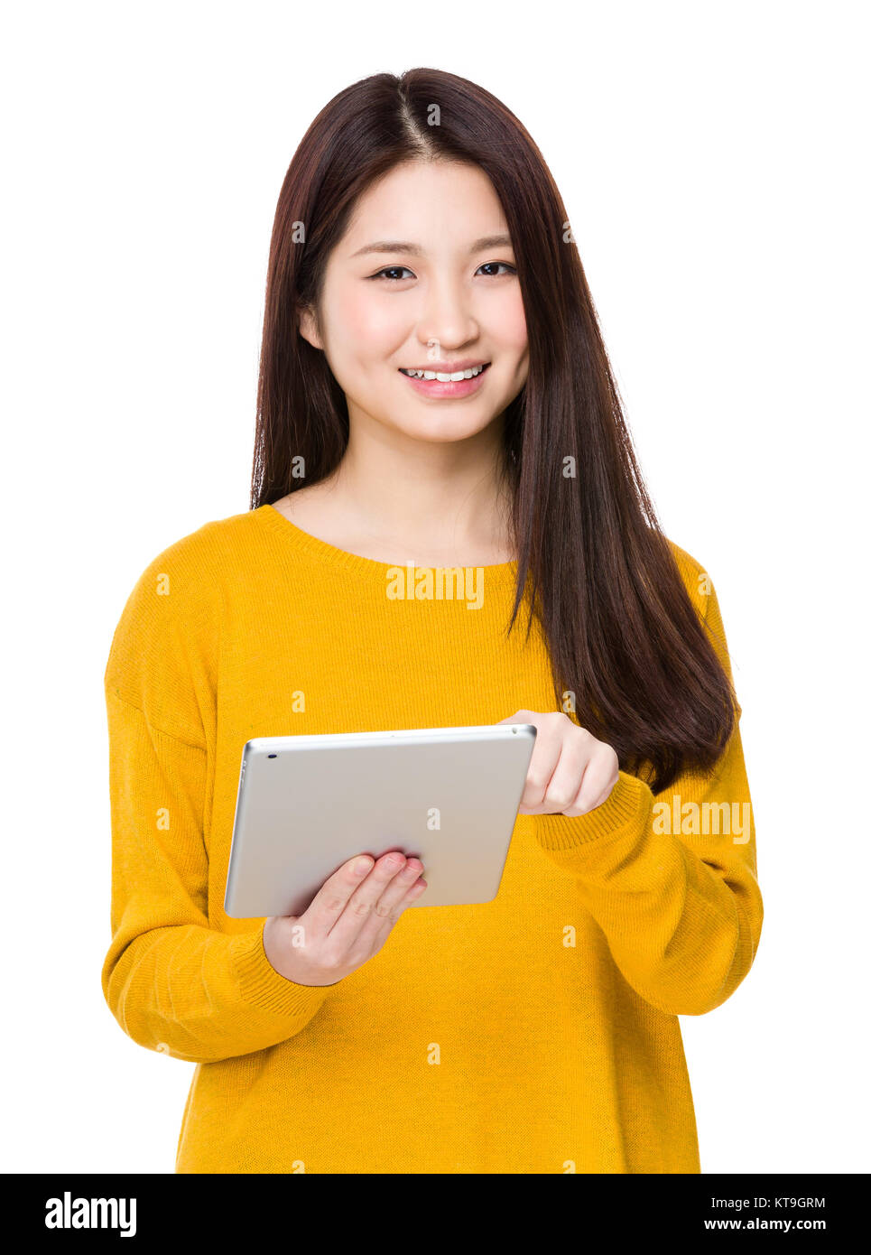Young woman use of the digital tablet Stock Photo - Alamy