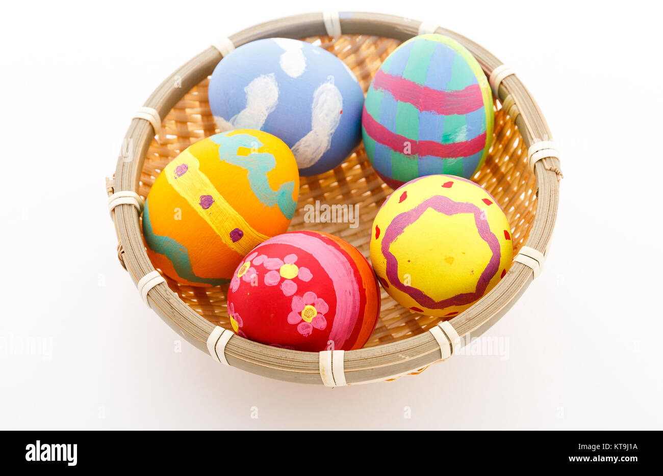 Colorful handmade easter eggs in a basket Stock Photo - Alamy