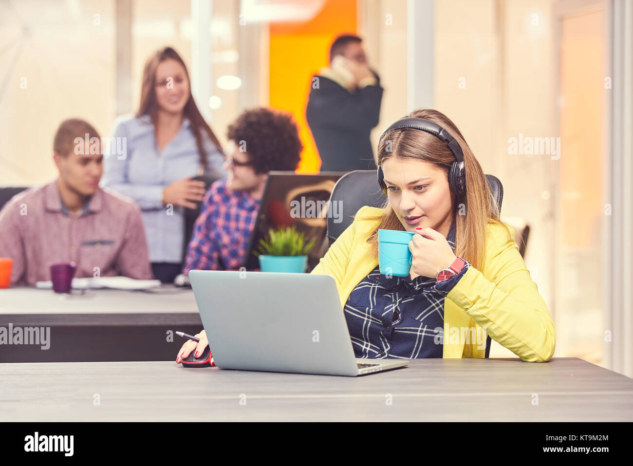 Portrait of startup group of creative people having a meeting with a ...