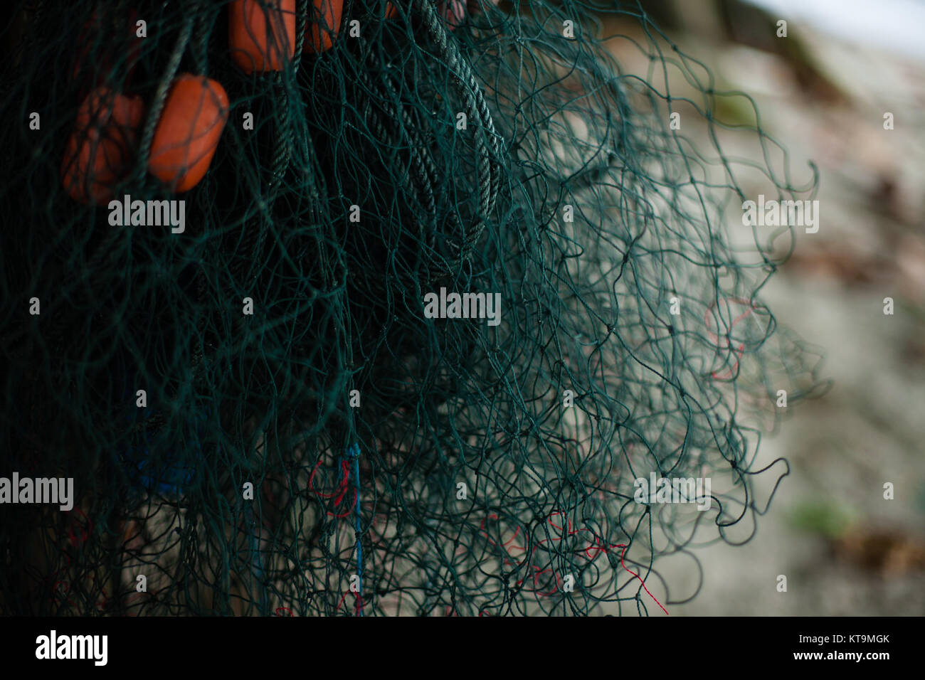 Background of color fishing net and cord on the heap Stock Photo - Alamy