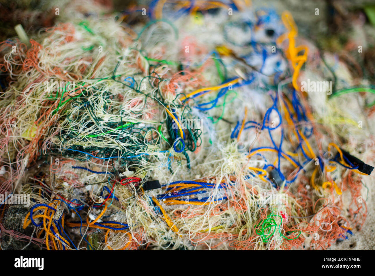 Background of color fishing net and cord on the heap Stock Photo - Alamy