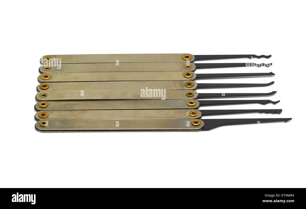 silver Lock picks isolated on white background Stock Photo - Alamy