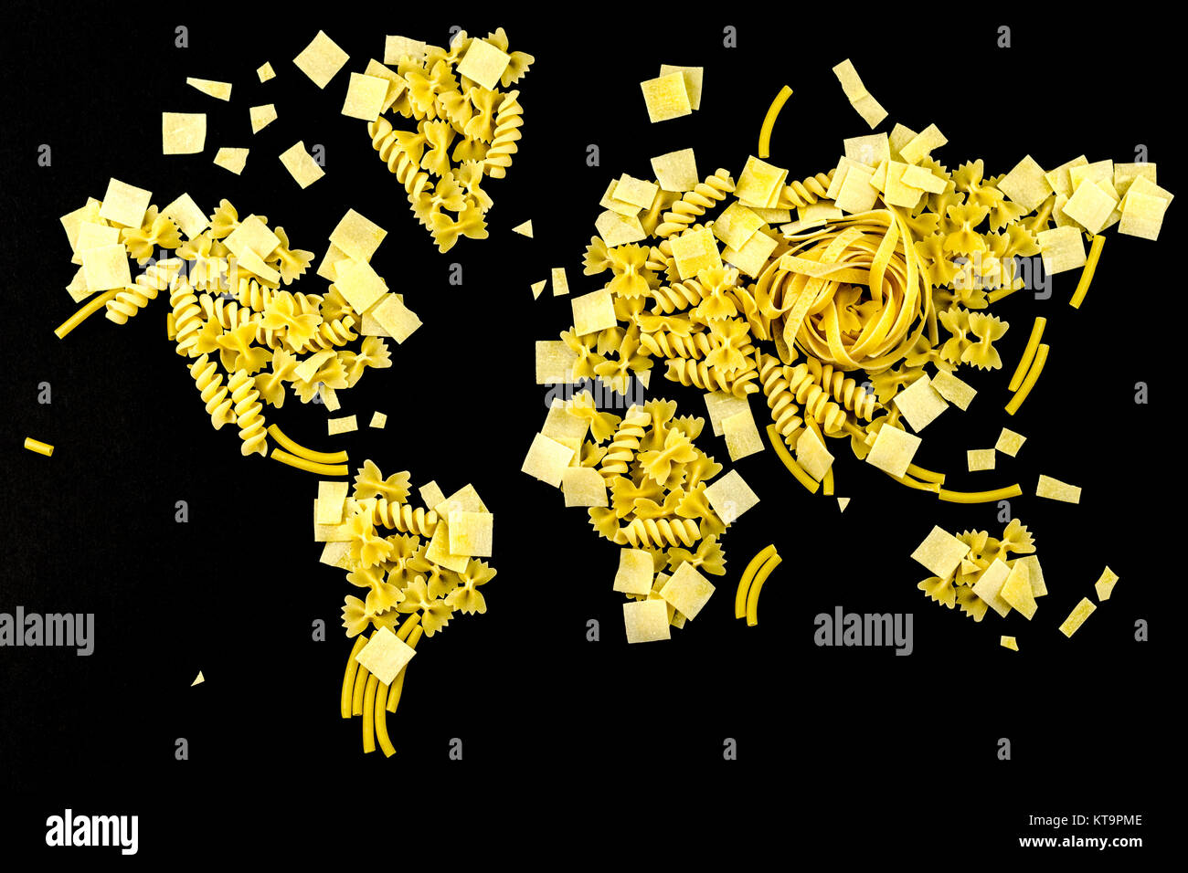 map of the world made of raw pasta on black background Stock Photo - Alamy