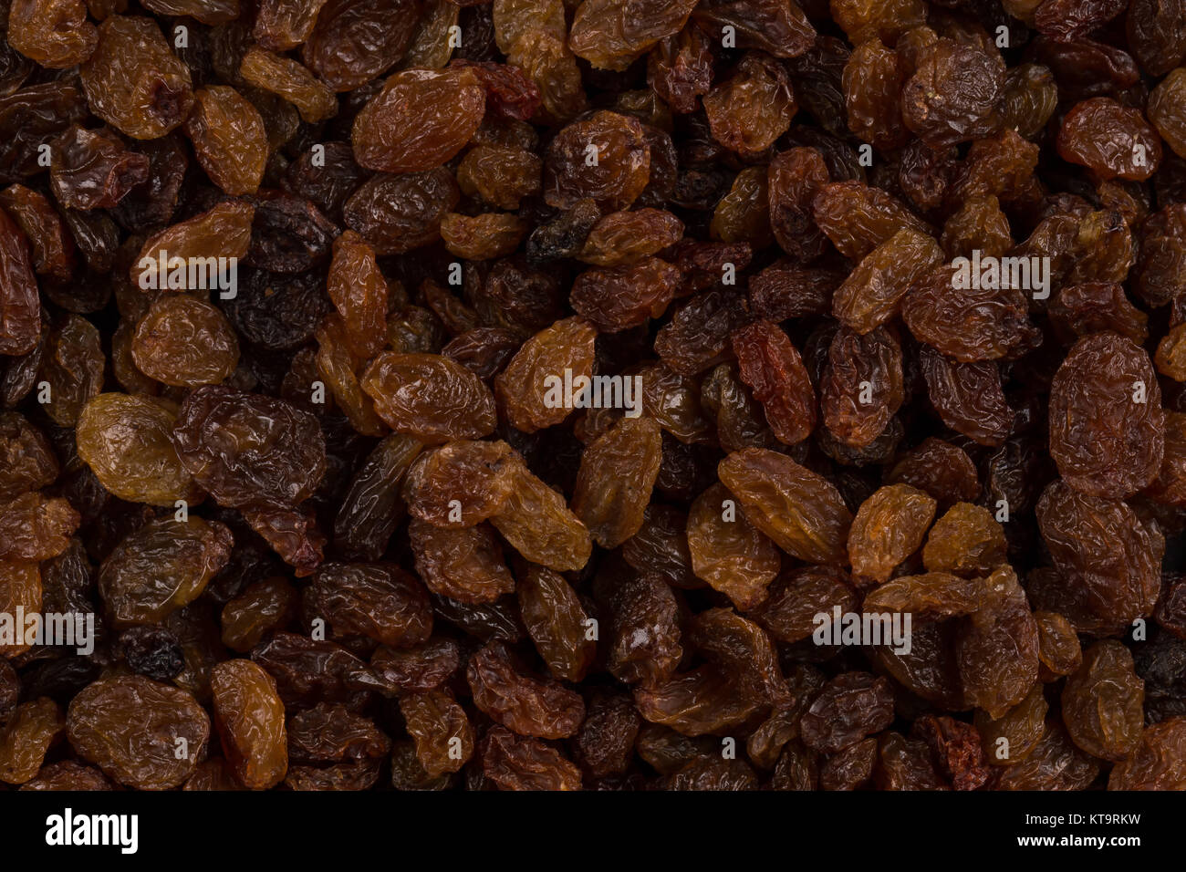Sweet raisins background Stock Photo - Alamy