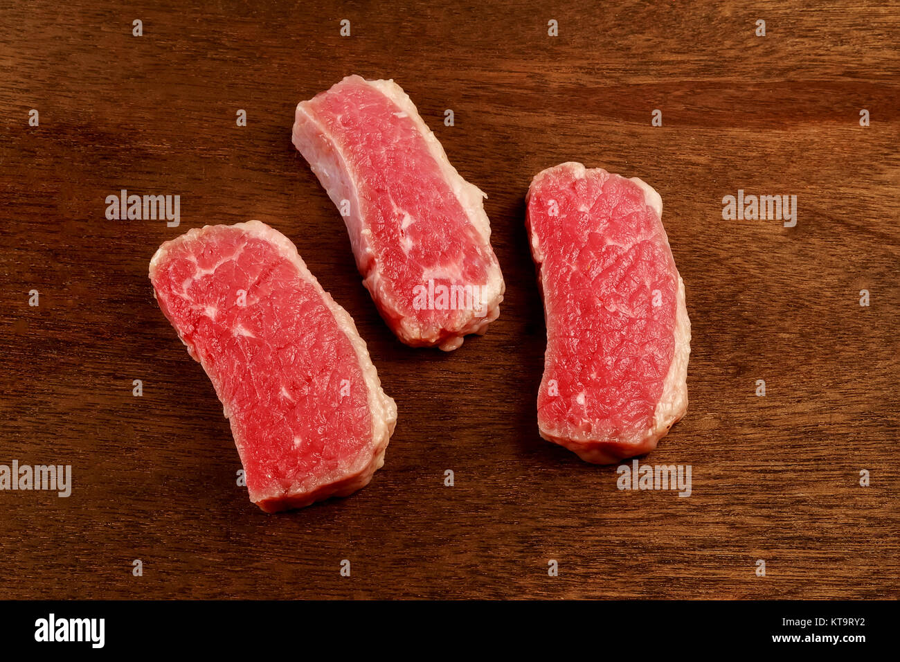Fresh raw beef steak isolated on white Stock Photo - Alamy