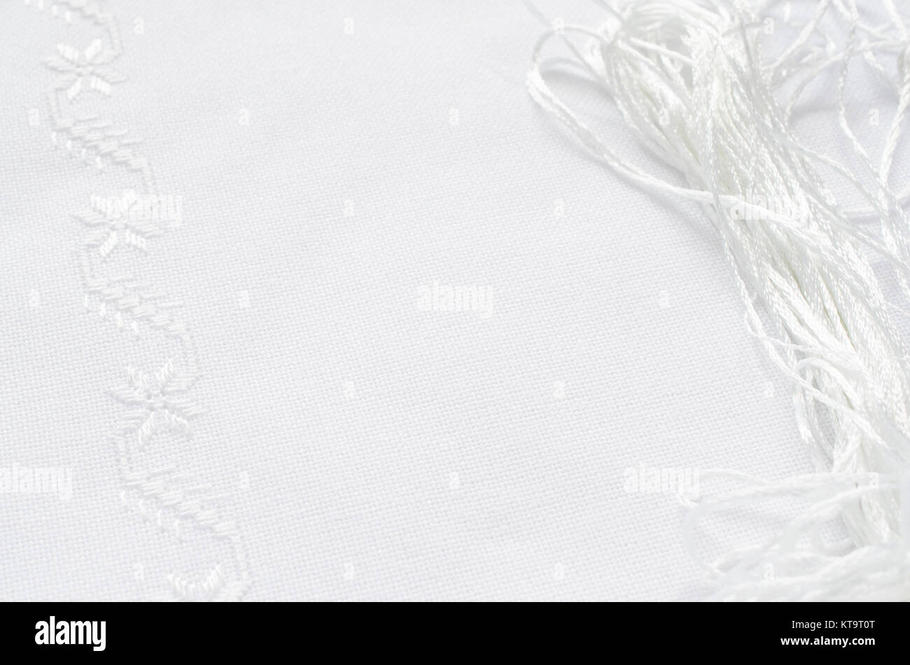 Texture of linen fabric with white silk embroidery Stock Photo - Alamy