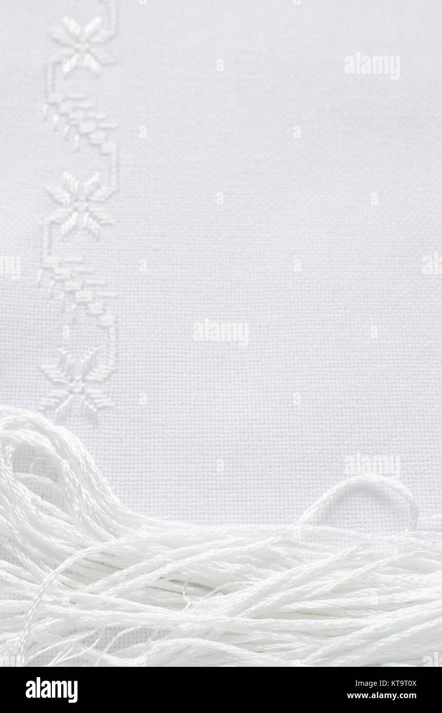 Texture of linen fabric with white silk embroidery Stock Photo - Alamy