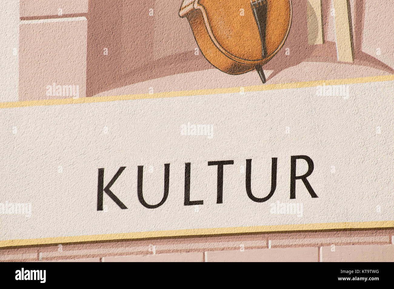 the word culture and part of a musical instrument on a house wall Stock ...