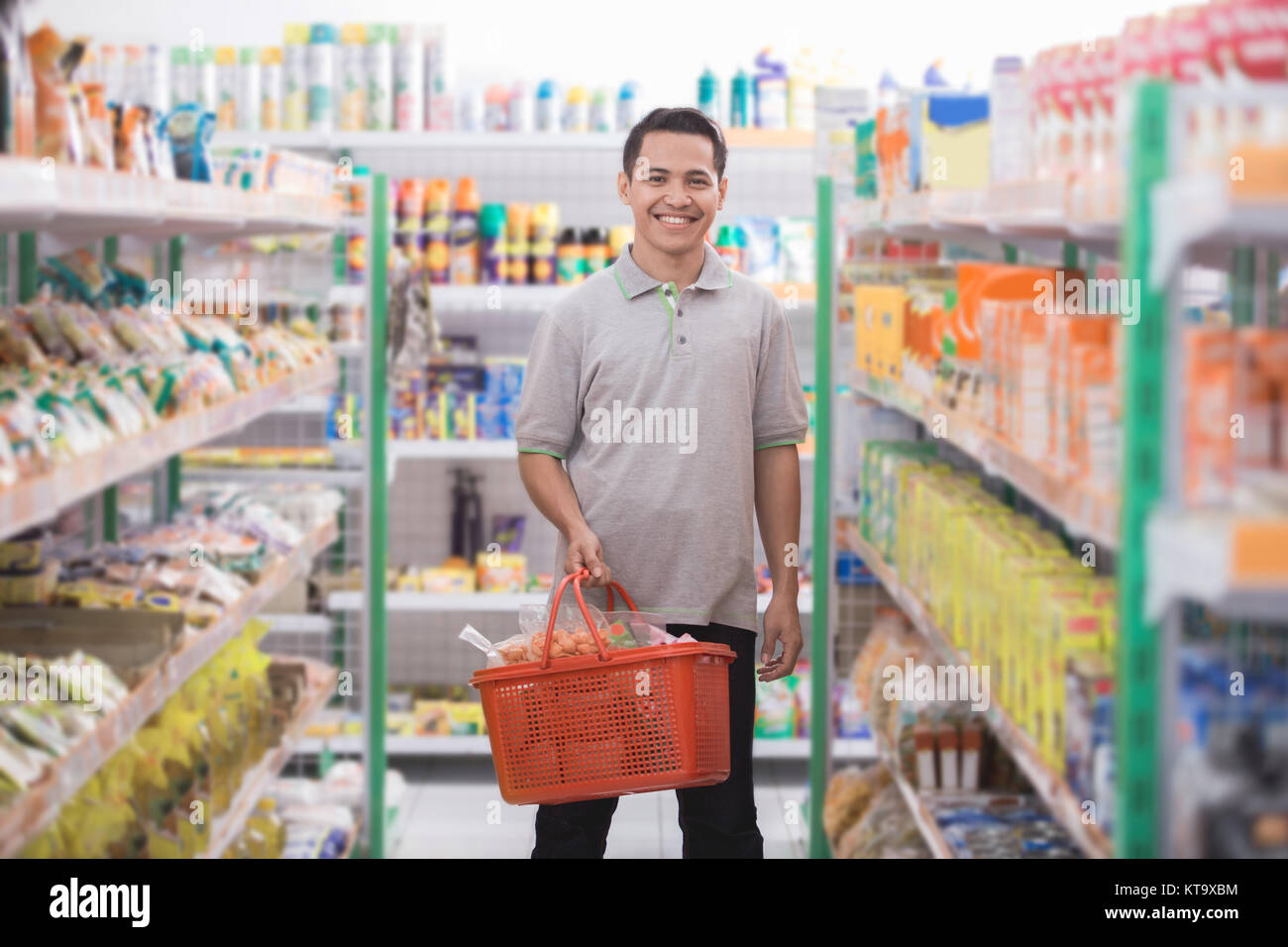 asian man buy some stuff at supermarket Stock Photo - Alamy