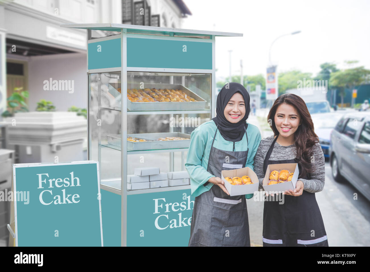 young muslim entrepreneur with her partner starting their business by ...