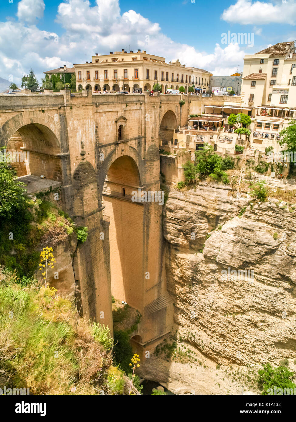 view of buildings over cliff in ronda, spain Stock Photo - Alamy