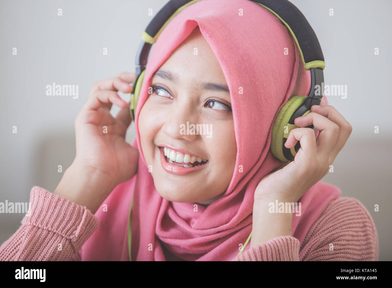 portrait of beautiful asian woman enjoying music Stock Photo - Alamy