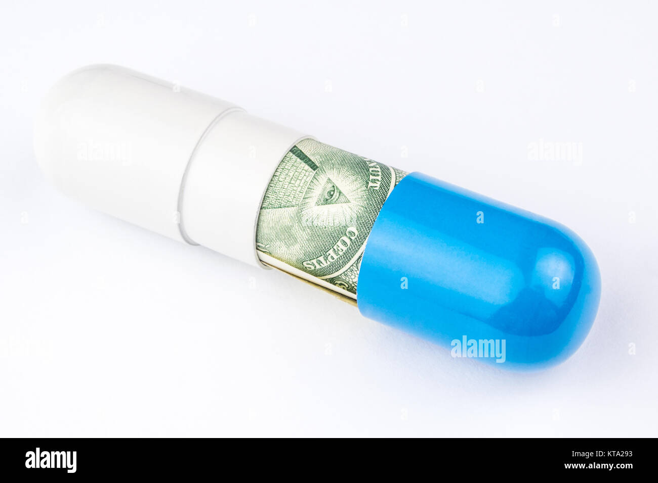 one dollar banknote is rolled into a big blue and white capsule looking ...