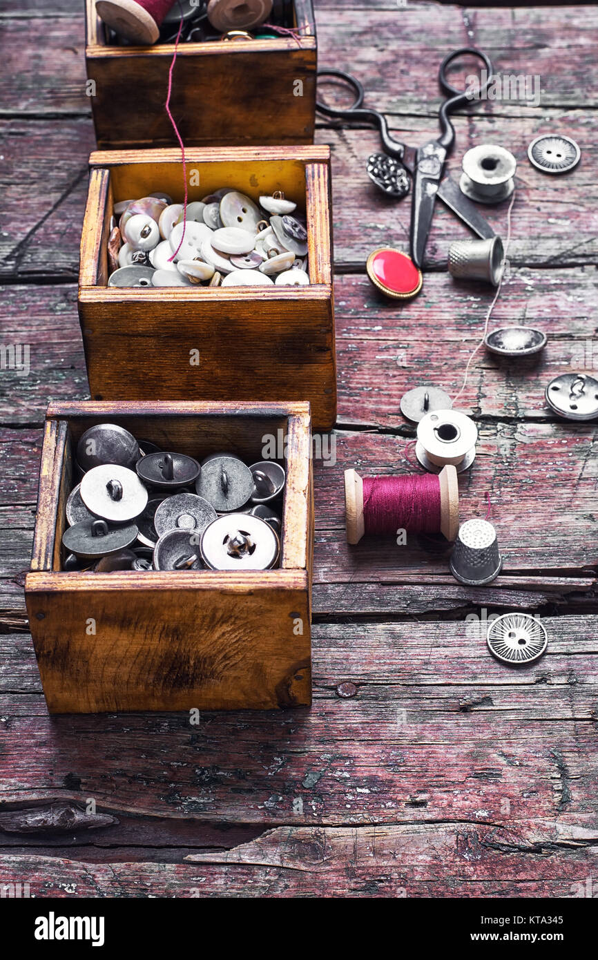 set of buttons from the clothing in wooden boxes in retro style Stock ...