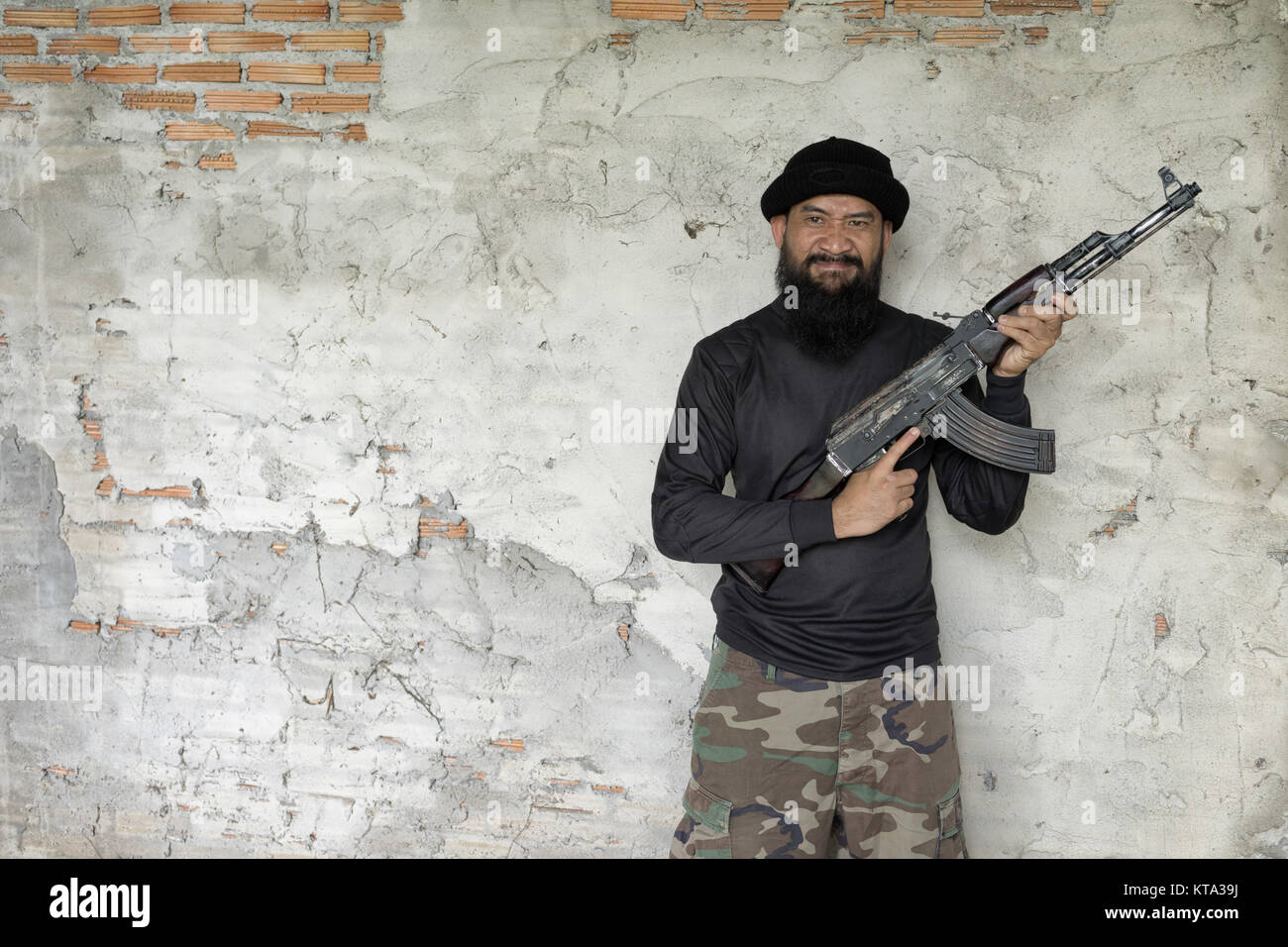 Terrorist balaclava kalashnikov hi-res stock photography and images - Alamy