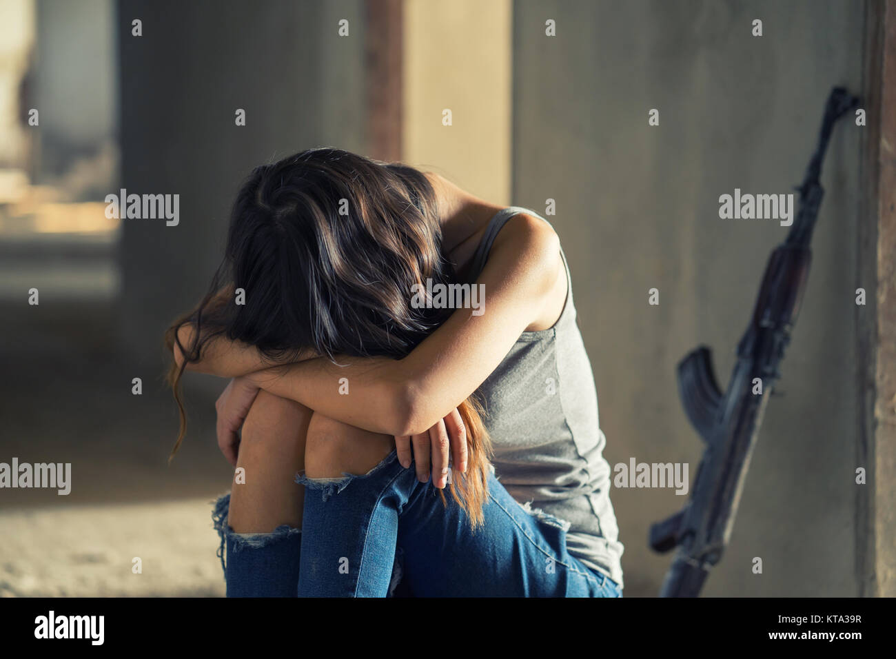 Man in balaclava threatening with gun to woman Stock Photo - Alamy