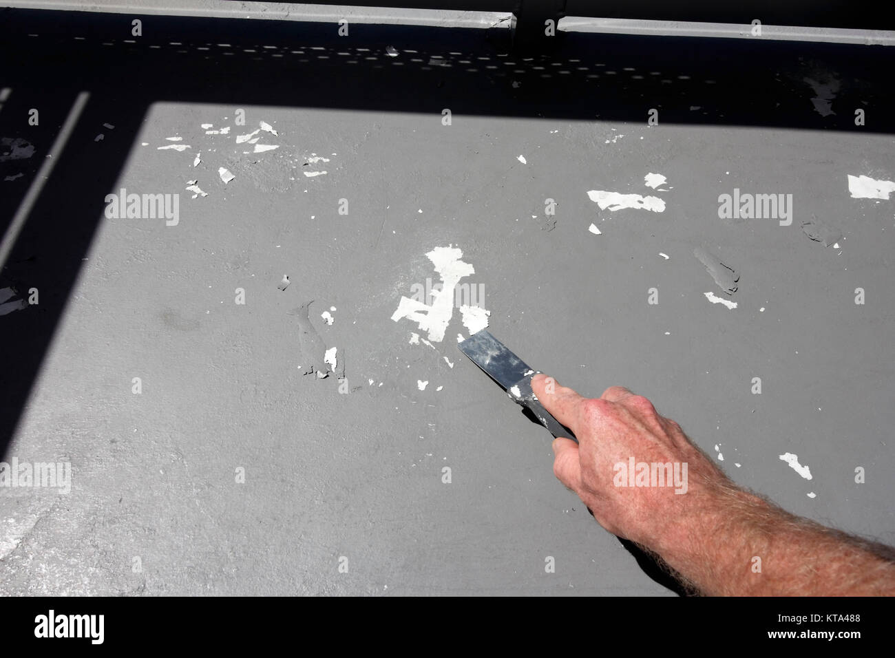 Scraping Loose Patio Paint Outdoors Stock Photo - Alamy