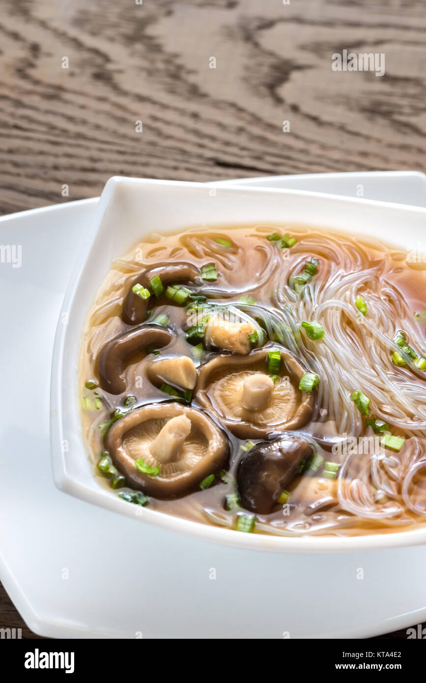 Bowl of shiitake soup on the wooden table Stock Photo - Alamy