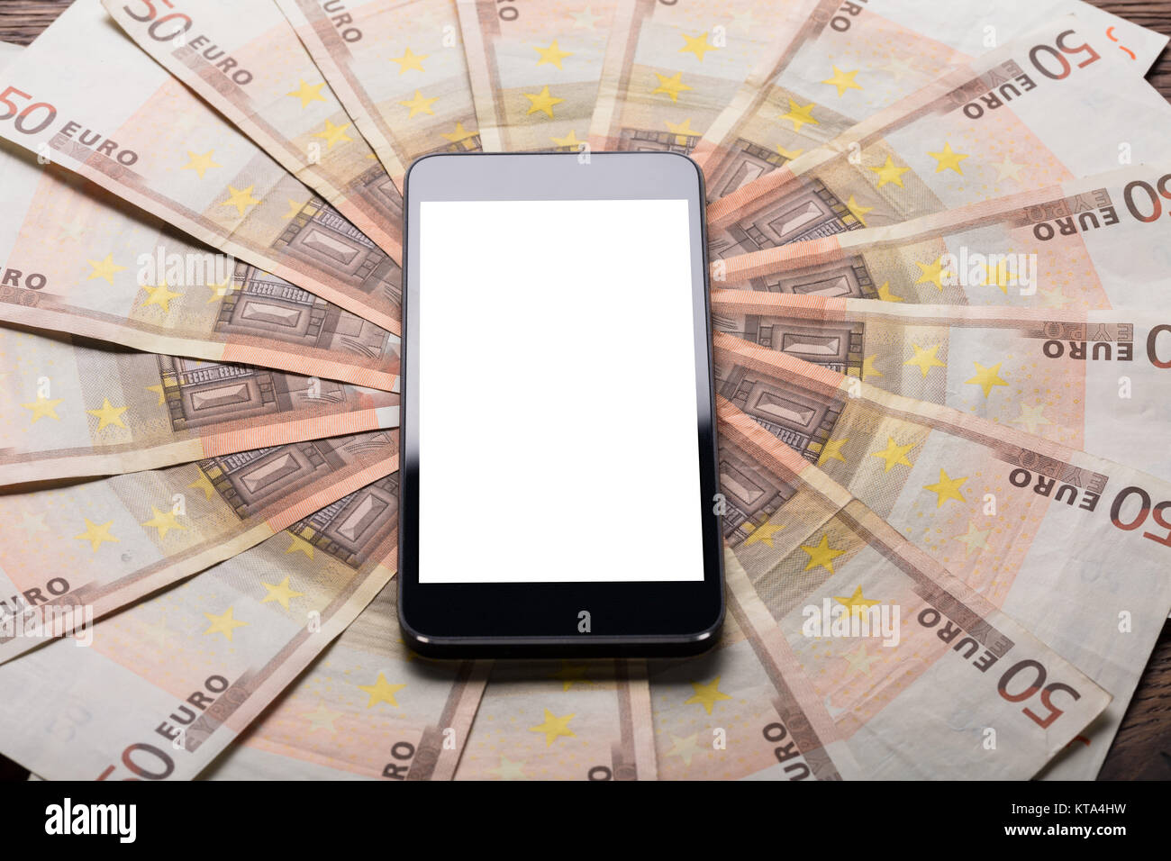 Mobile Phone On Euro Note Stock Photo - Alamy