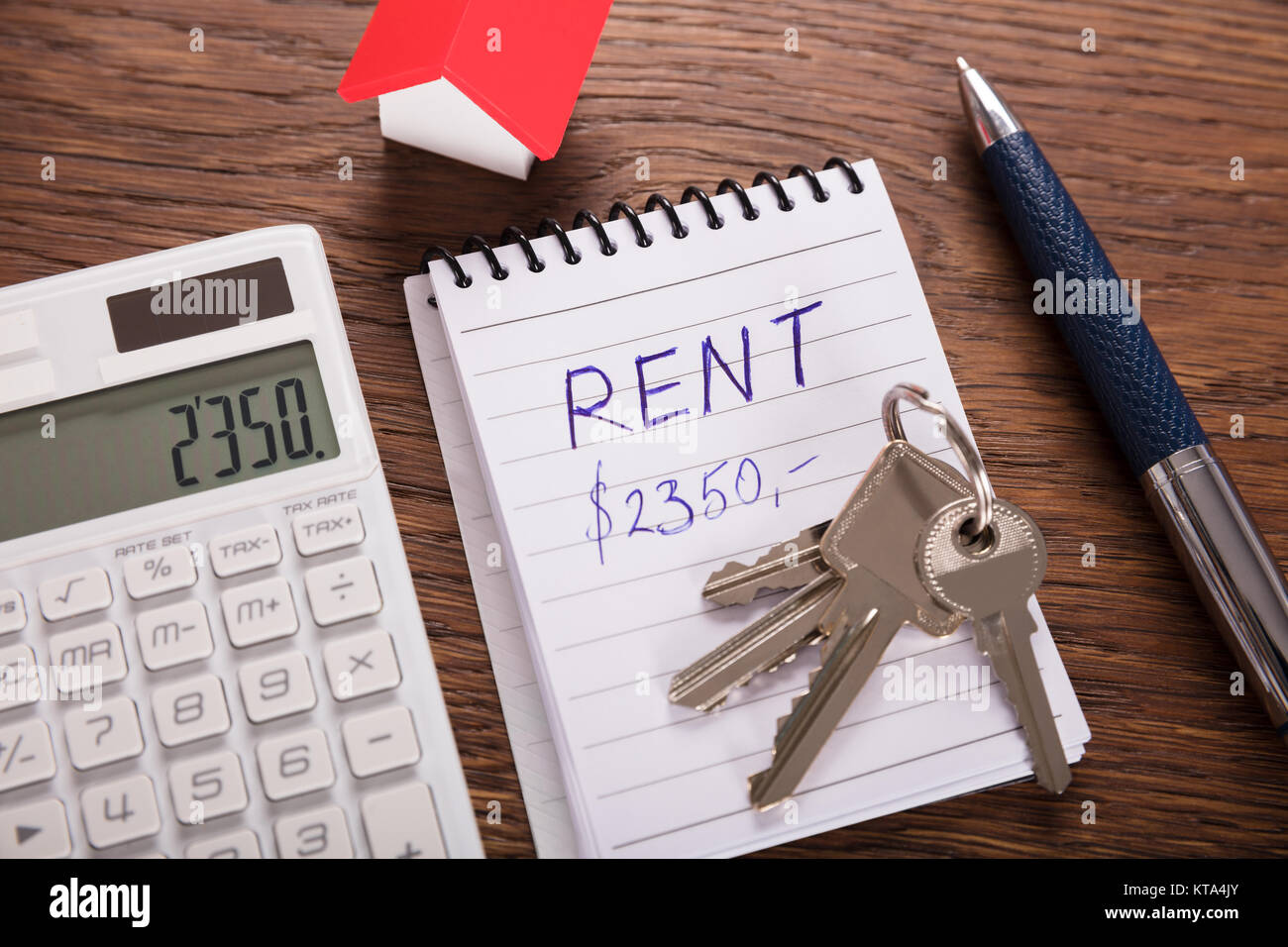 Rent House Concept On Wooden Desk Stock Photo - Alamy