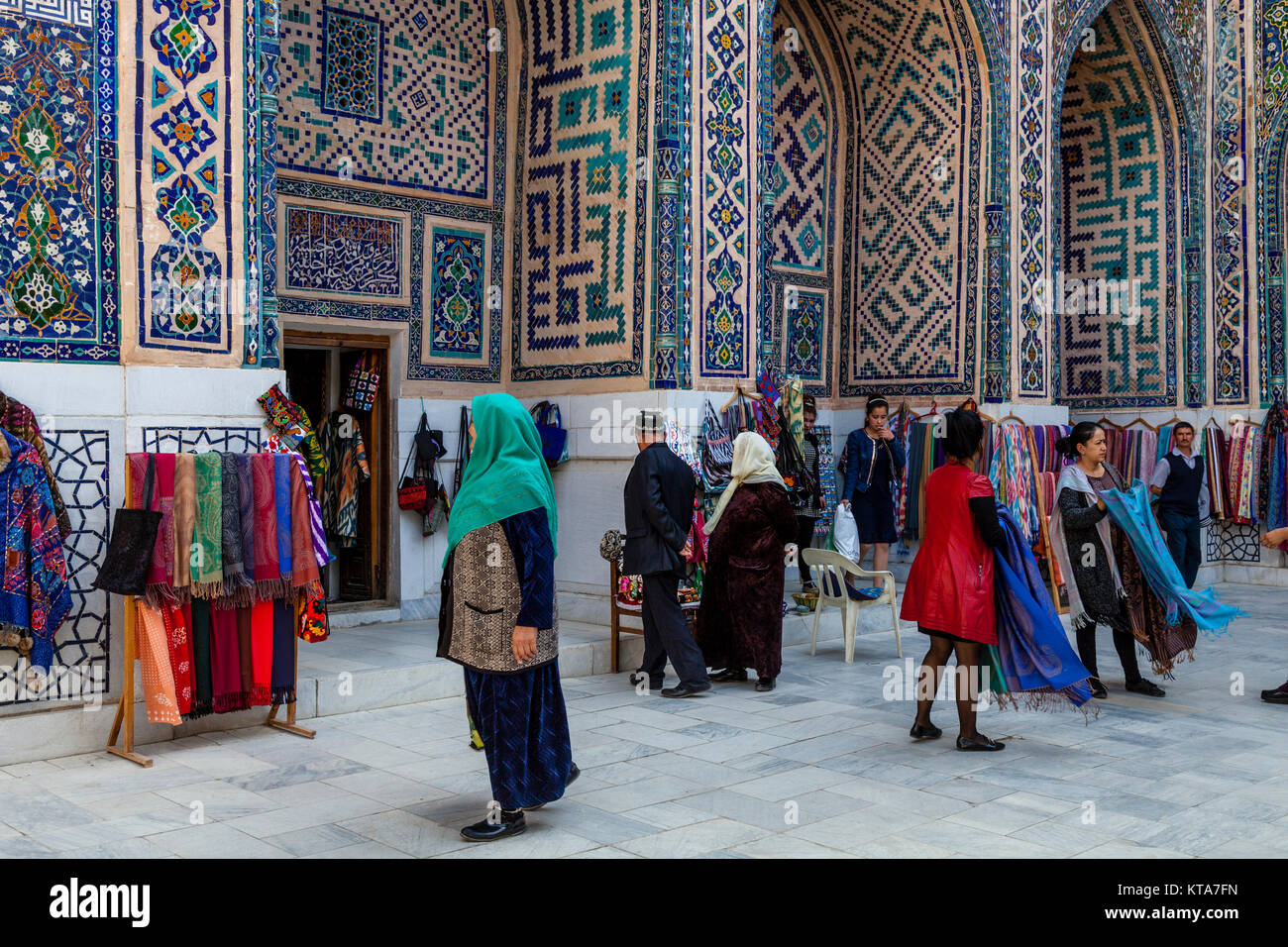 Uzbek Visitors Shopping For Souvenirs Inside The Ulugh Beg Madrassa ...