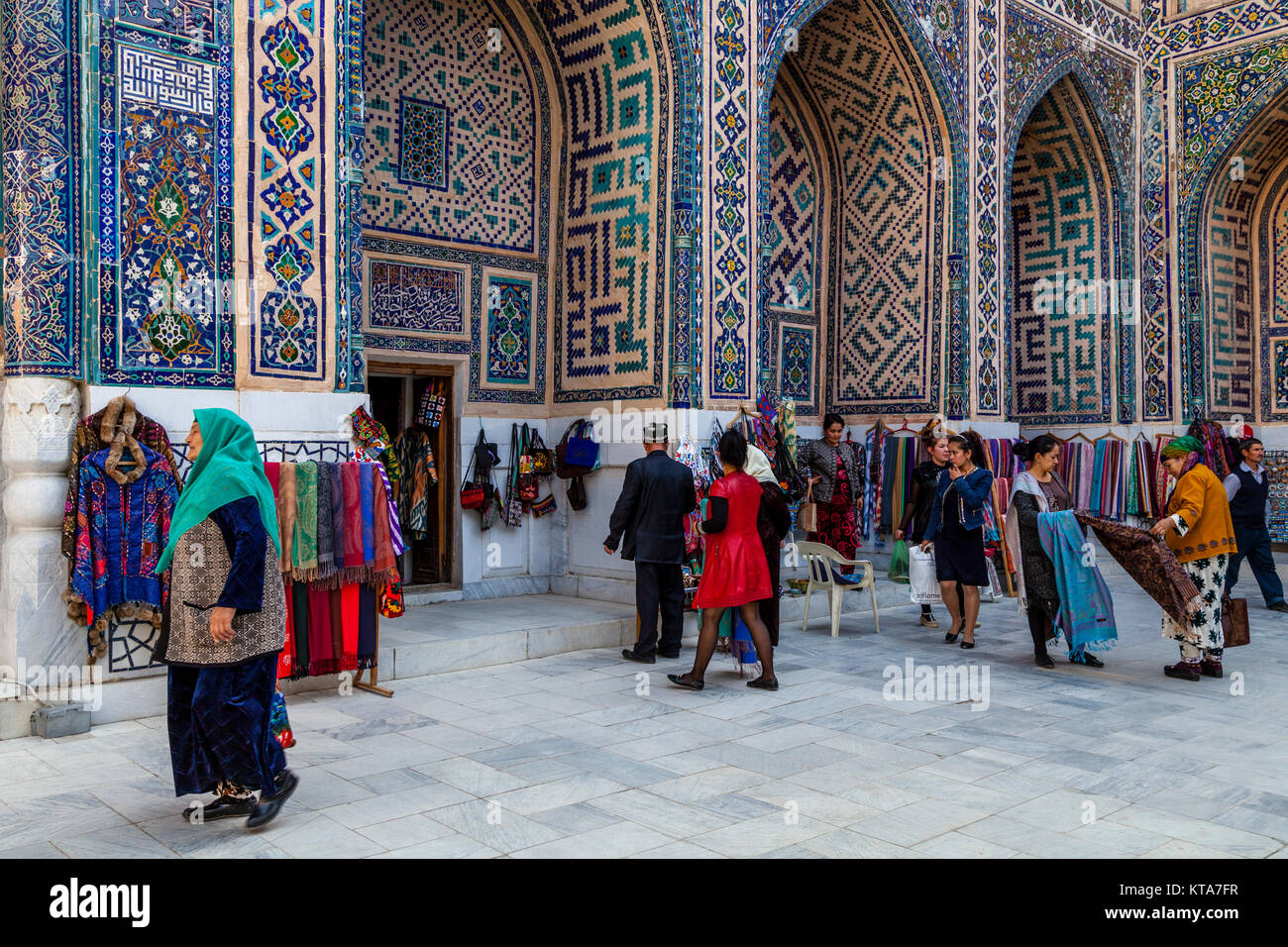 Uzbek Visitors Shopping For Souvenirs Inside The Ulugh Beg Madrassa ...