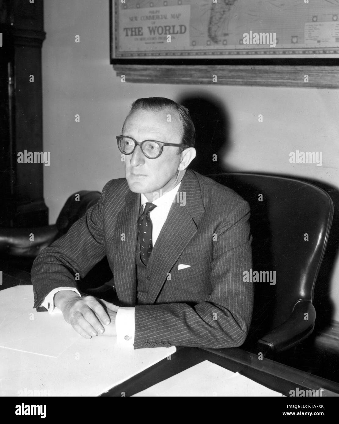 Lord Carrington, 40, the First Lord of the Admiralty, at his desk at ...