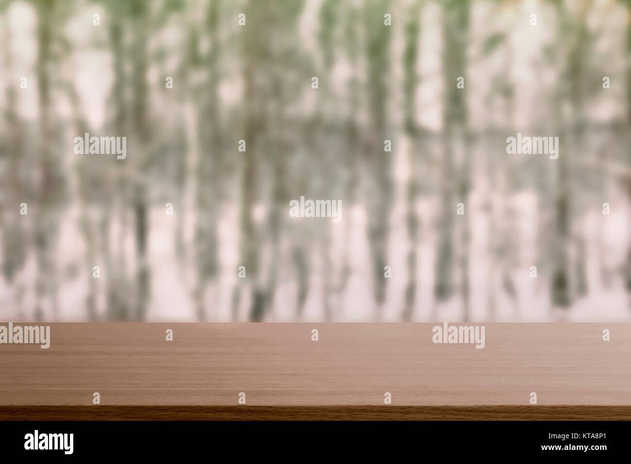 Wooden surface on the background of blurred scenery outside the window ...