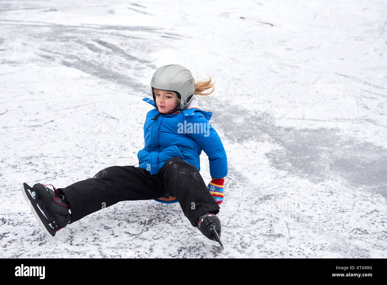 Falling on ice skates hi-res stock photography and images - Alamy