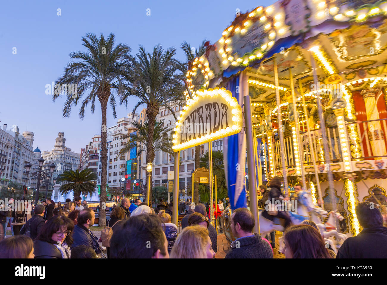 Christmas fair with carousel on Modernisme Plaza of the City Hall of ...