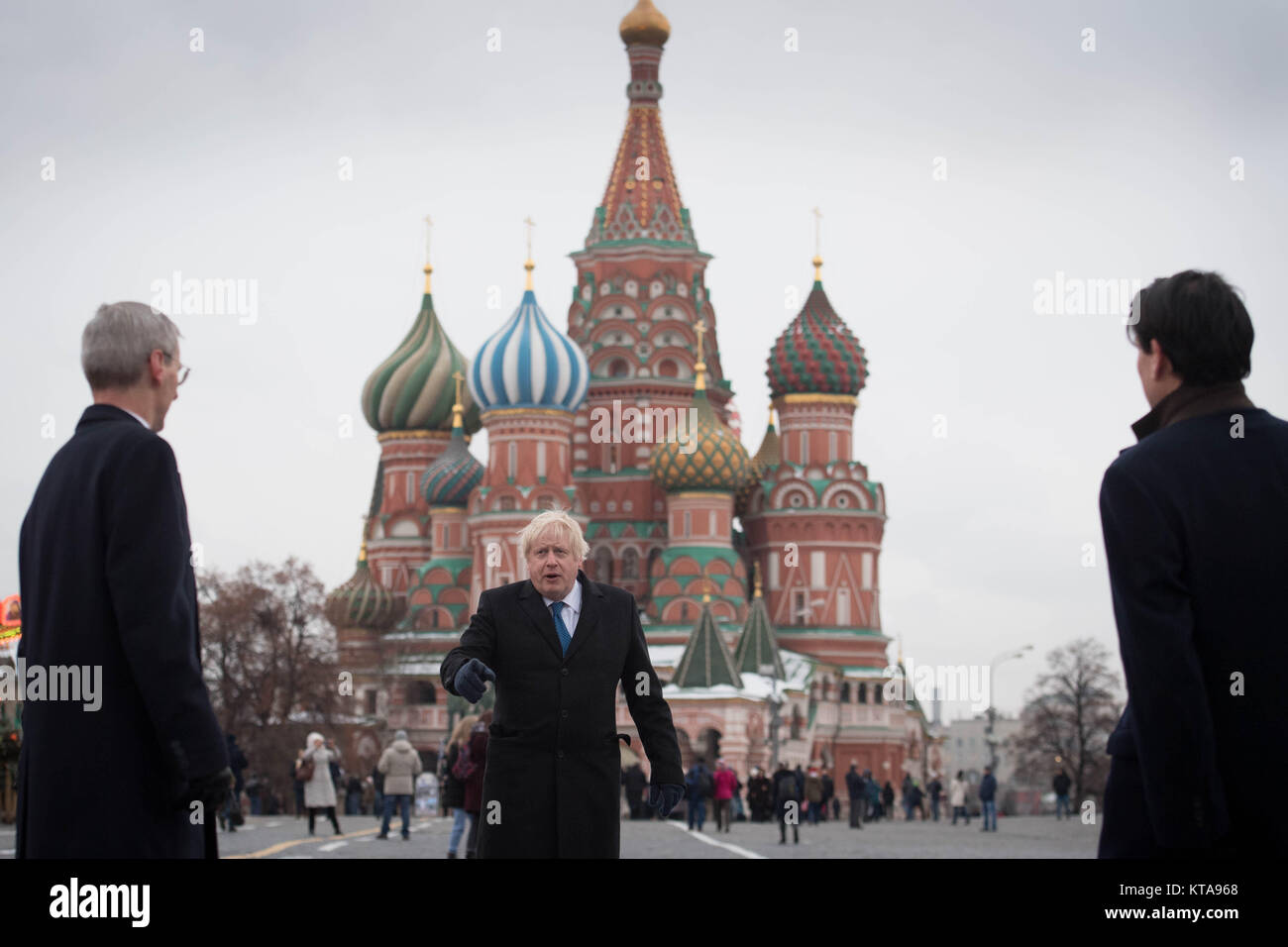 Foreign Secretary Boris Johnson stands in front of St Basil's Cathedral ...