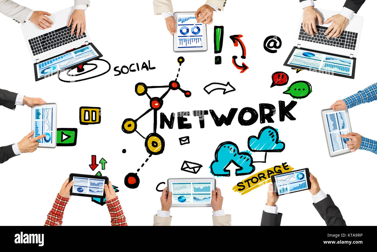 Group of people with devices in hands working together as symbol of ...