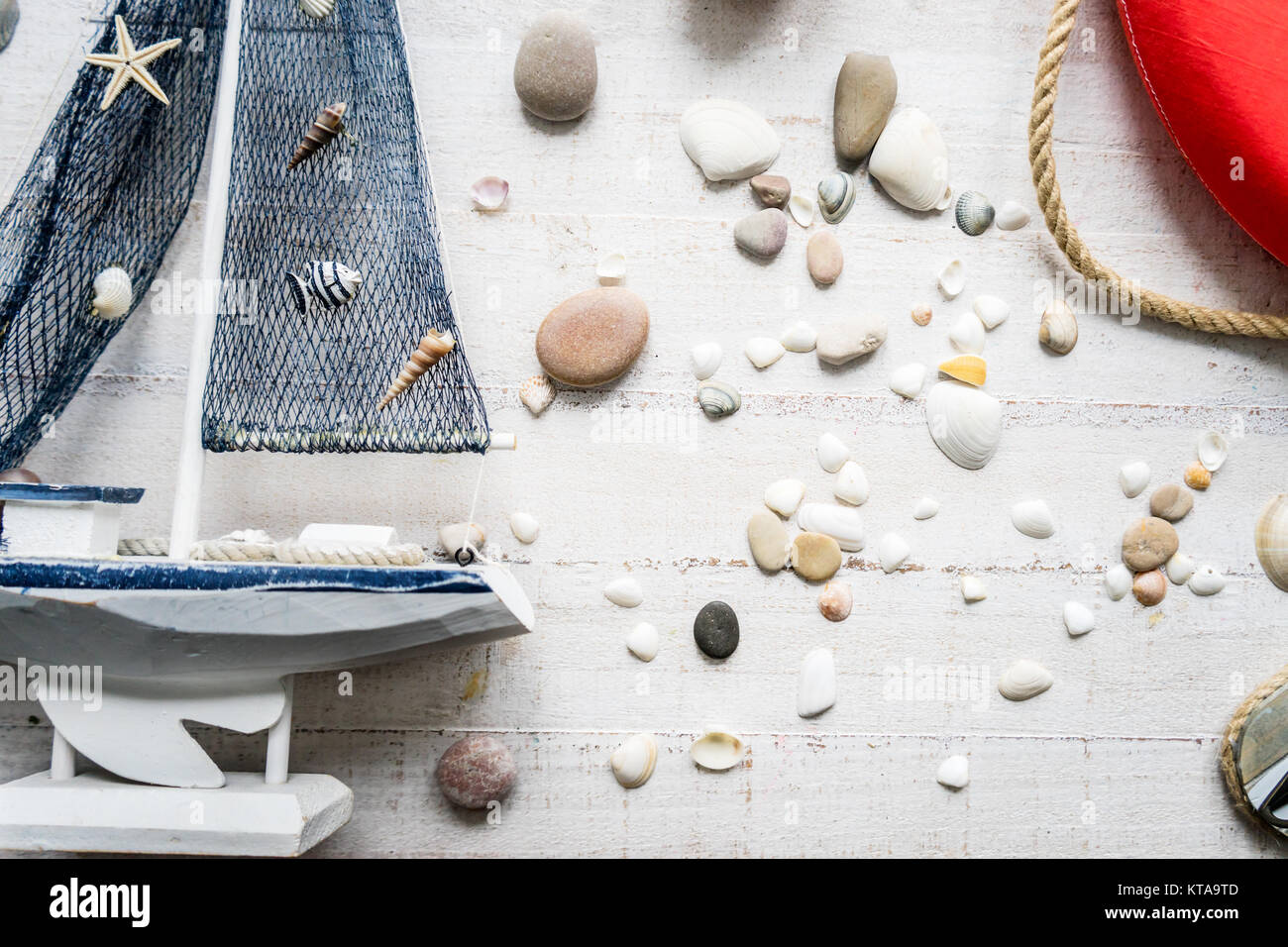 Sea theme decorations of the kids room, such as cute wooden boat, sea ...