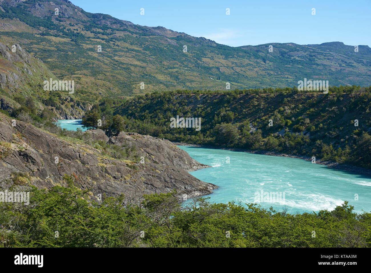 Blue glacial waters of the Rio Baker snaking through the lush ...