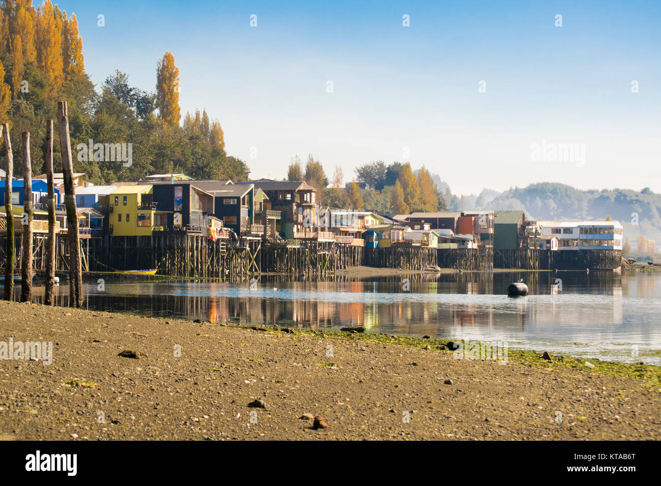 Typical palafito houses at lake in Castro city, Chiloe Island, Chile ...