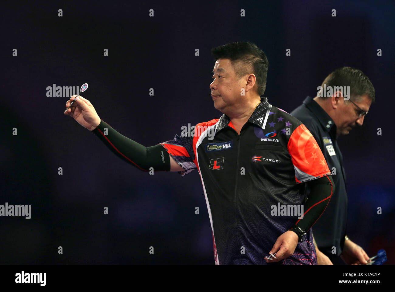 Paul Lin (left) and Gary Anderson in action during day nine of the ...