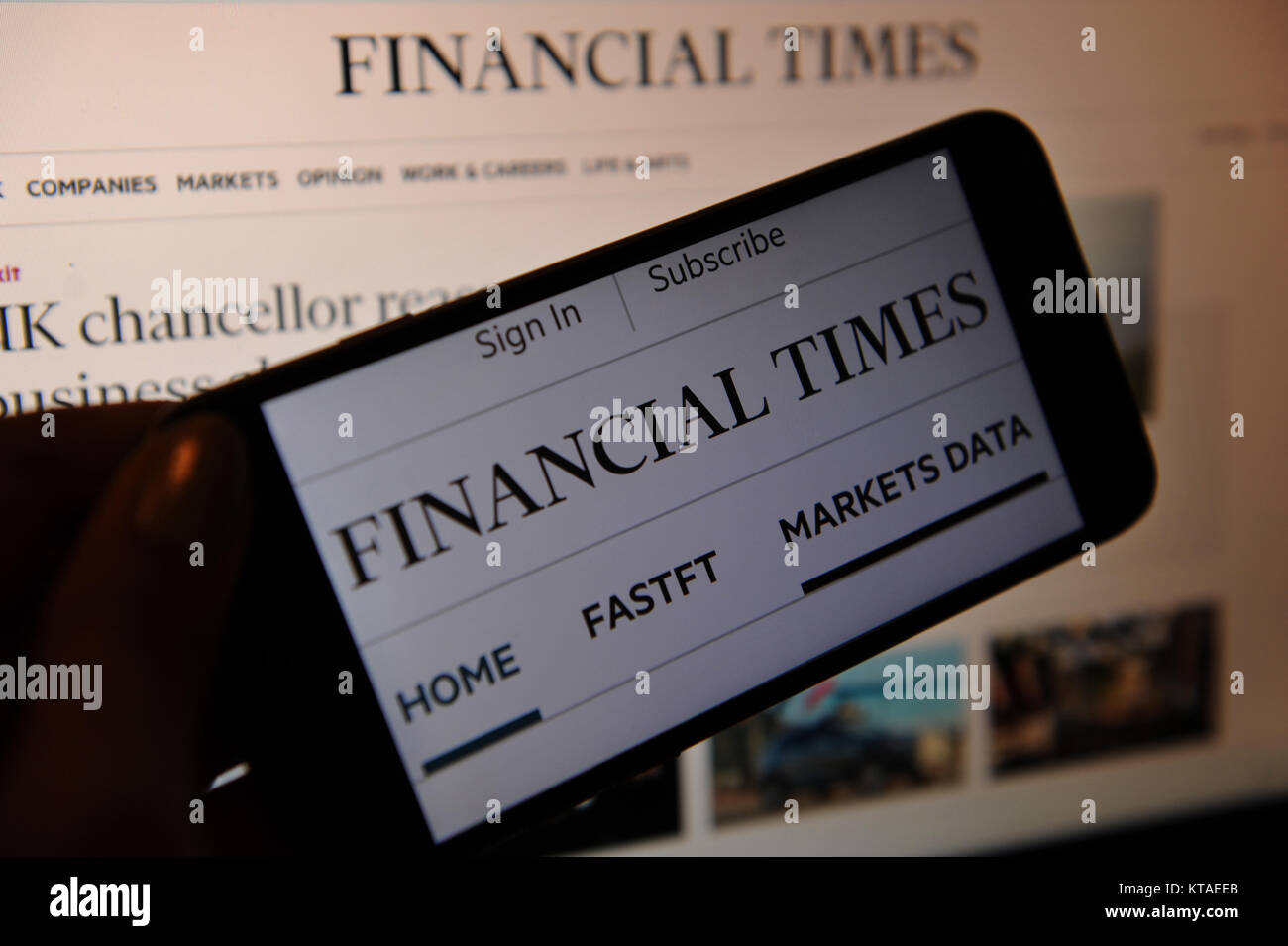 The Financial Times website on a phone and a website Stock Photo - Alamy