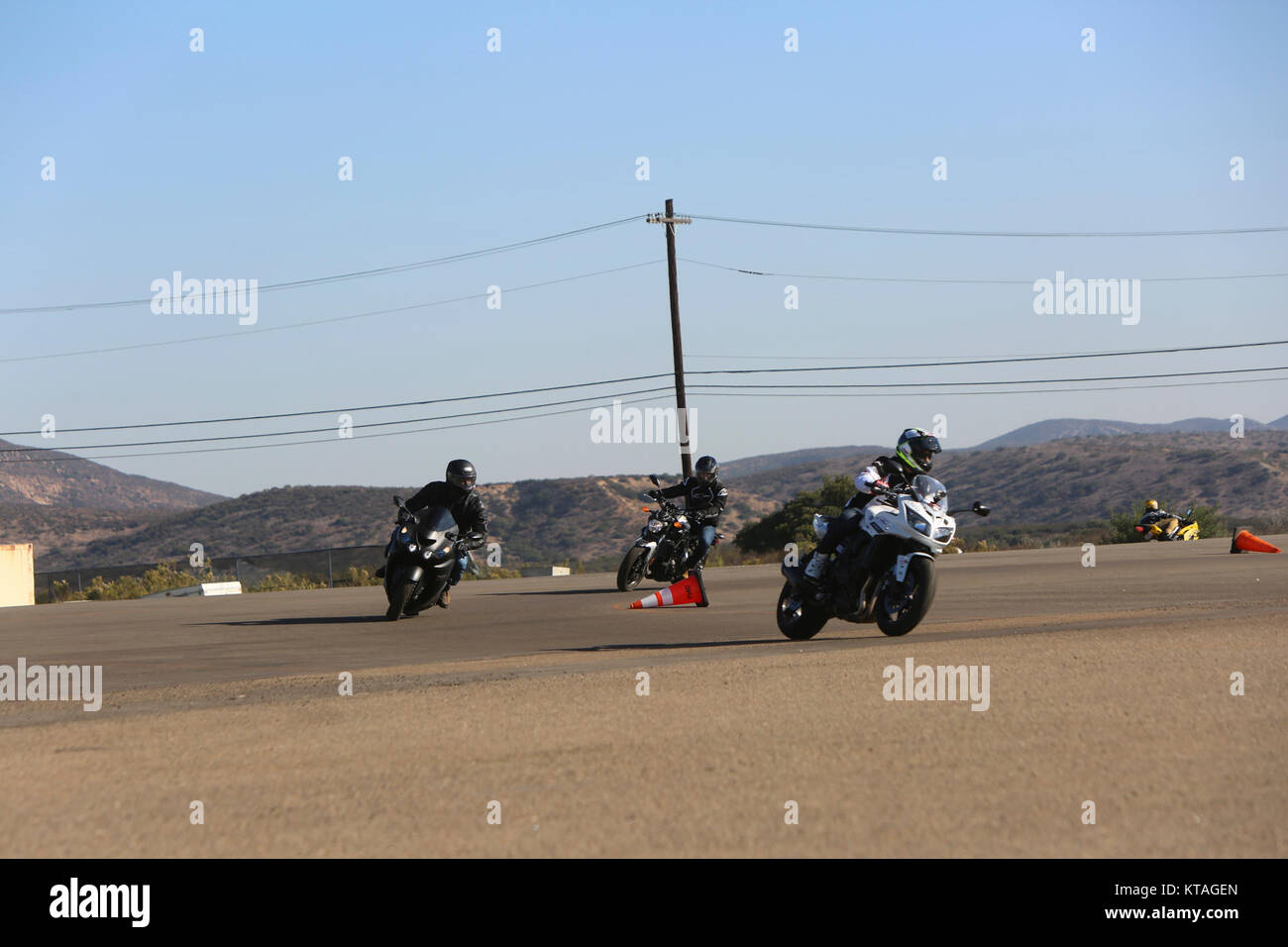 Marines practice turns while riding motorcycles during the Yamaha ...