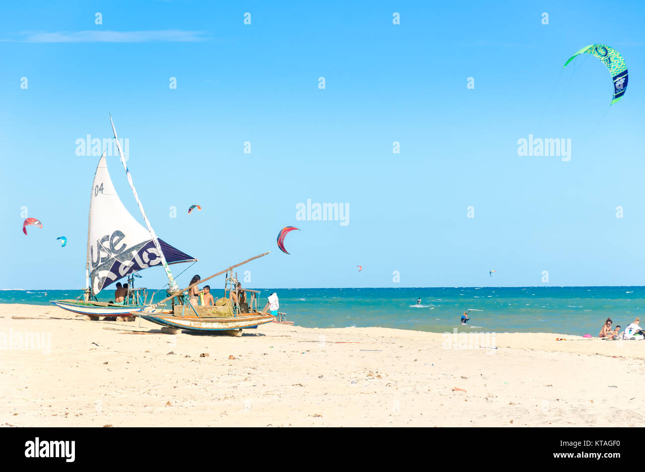 Cumbuco, Brazil, jul 9, 2017: Parked jangada boat over a paradise white ...
