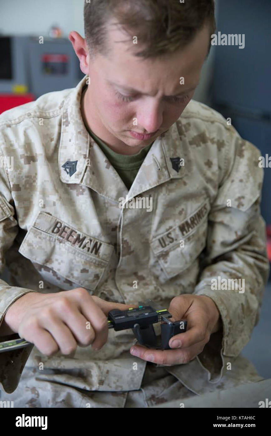 U.S. Marine Corps Sgt. Josiah G. Beeman, a machinist, with Ordnance ...